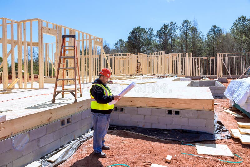 Construction Inspector Used Blueprints To Verify Quality of Work Being ...