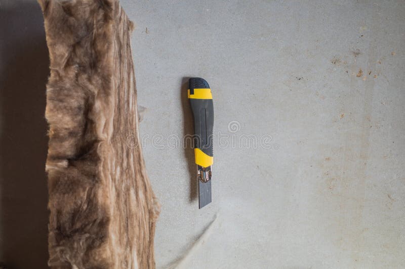Construction Knife for Cutting Insulation for Laying in a Frame House ...