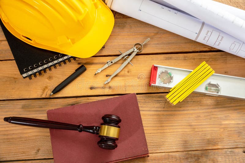 Construction and Labor Law. Judge Gavel and Design Tools on Table Stock ...
