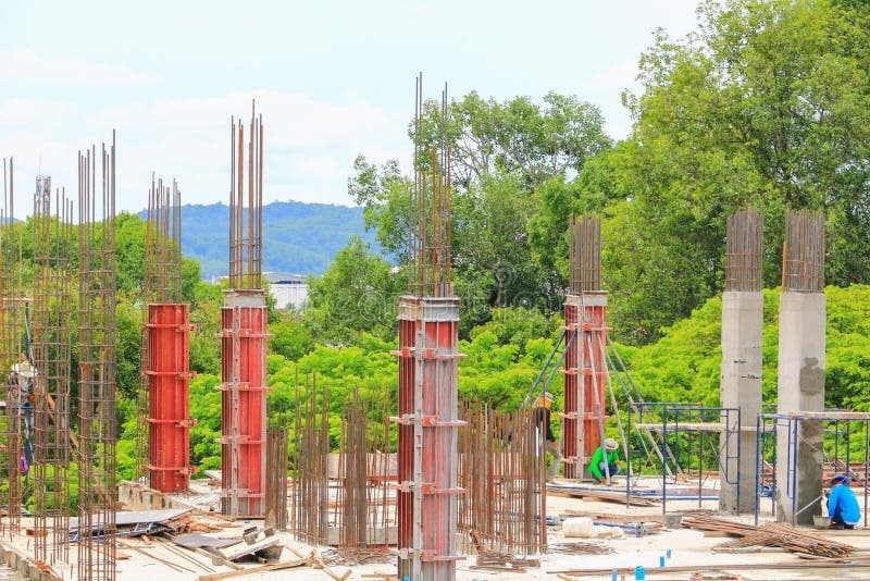 Construction Laborer Team Working on High Ground Building Commercial in ...
