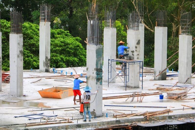 Construction Laborer Team Working on High Ground Building Commercial in ...