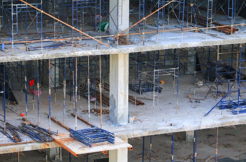 Construction Laborer Team Working on High Ground Building Commercial in ...