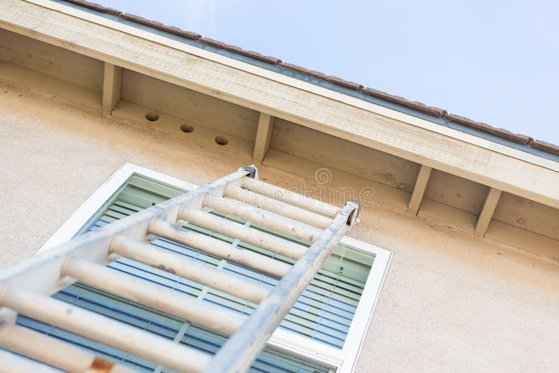 Construction Ladder Leaning Against House Stock Photo - Image of ...