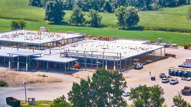 Construction of Large Building with Metal Support Beams and Tiered ...