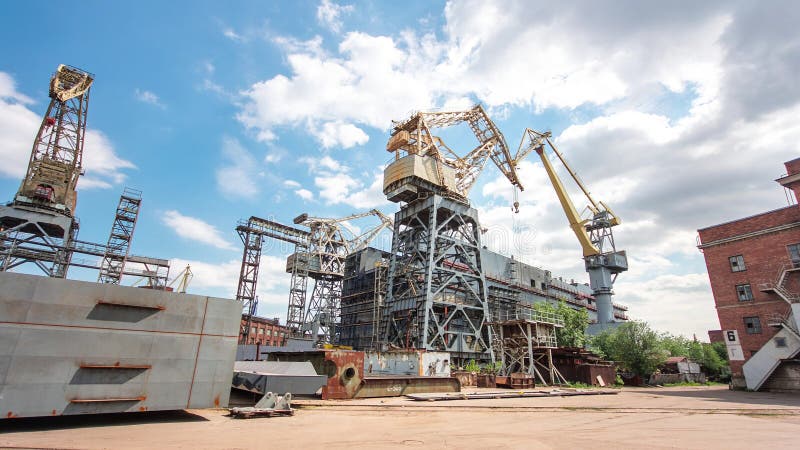 The Construction of a Large Ship on a Shipyard with Cranes Timelapse ...