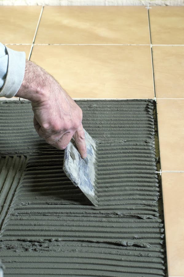 Construction, Laying Tiles, Work Uses Trowel Stock Image - Image of ...