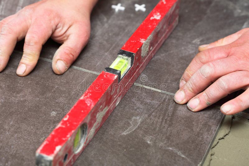 Construction Level Tiling at Home Tile Floor Adhesive Stock Image ...