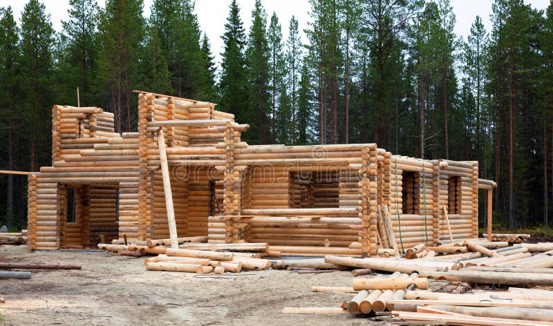 Construction of log houses stock photo. Image of architecture - 26844136