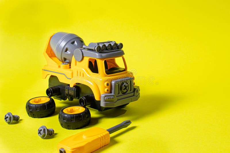 Construction Machine Concrete Mixer Made of Plastic on a Yellow ...