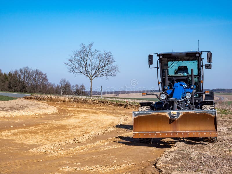 Construction Machine for a New Road Construction Stock Image - Image of ...