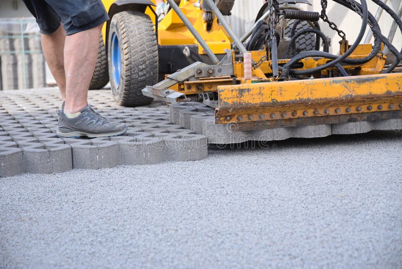 Construction Machine on Construction Site with Grass Pavers Stock Image ...