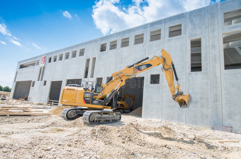 Construction Machinery on Buildings Site Against Blue Sky Stock Photo ...