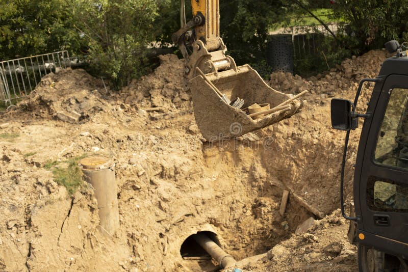 Construction Machinery is Digging a Hole Stock Photo - Image of digger ...