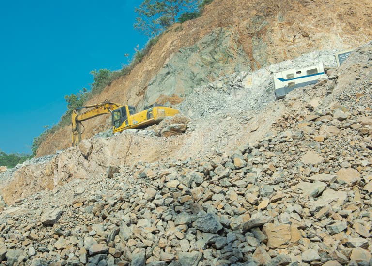 Construction Machinery and Heavy-duty Excavator Working on Top of Giant ...