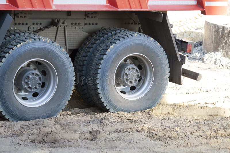 Construction Machinery with Large Wheels at a Construction Site Close ...