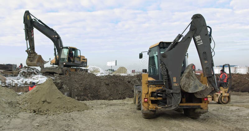 Construction Machinery at Work on Building a House. Different Types of ...