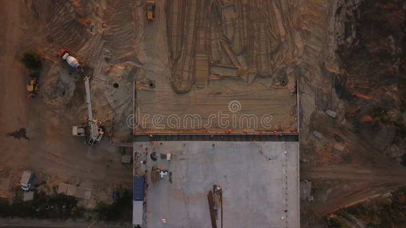 Construction Machinery at Work Levels the Surface with Sand at the ...