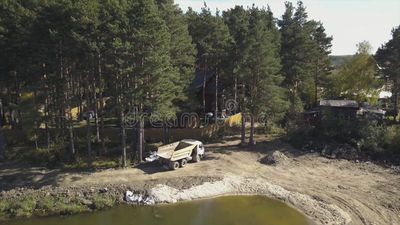 Construction Machines in the Forest. Clip. Forest Road Construction ...