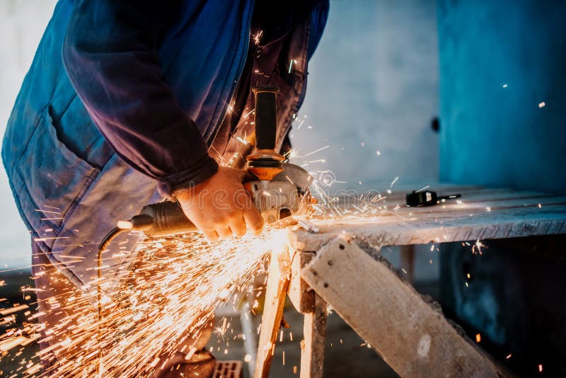 Construction Male Worker Using Electrical Angle Grinder for Cutting ...
