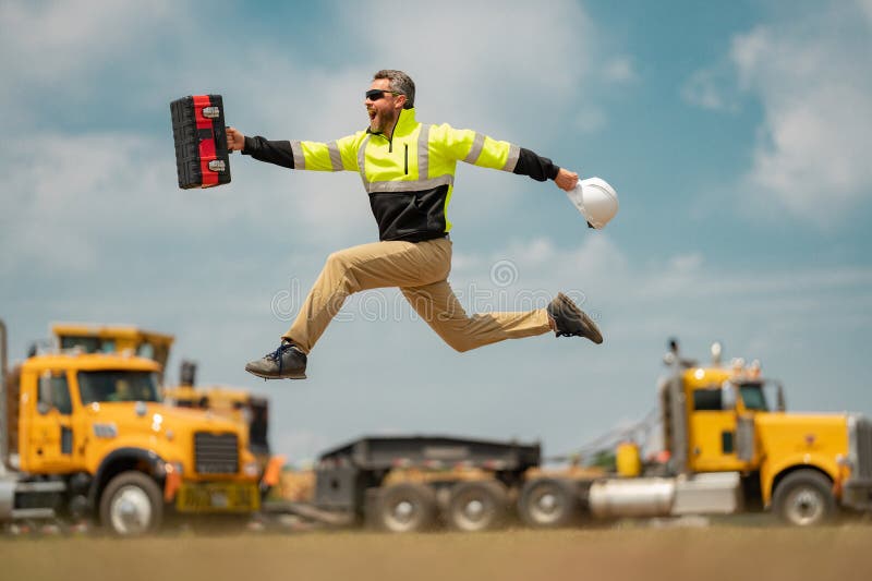 Construction Man Excited Jump with Helmet. Worker at Construction New ...