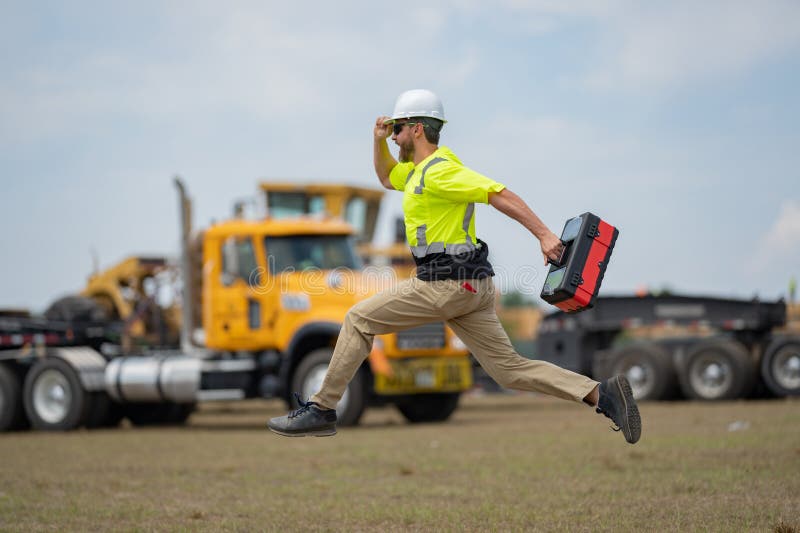 Construction Man Funny Jump with Helmet. Worker at Construction New ...