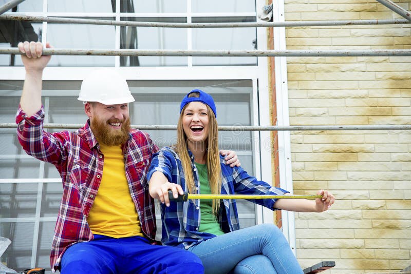 Couple building a house stock image. Image of house - 103351175