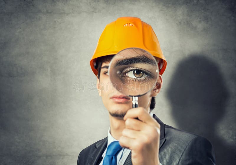 Construction Man with Magnifier Stock Photo - Image of grey, expertise ...