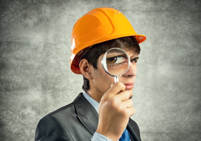 Construction Man with Magnifier Stock Photo - Image of magnification ...