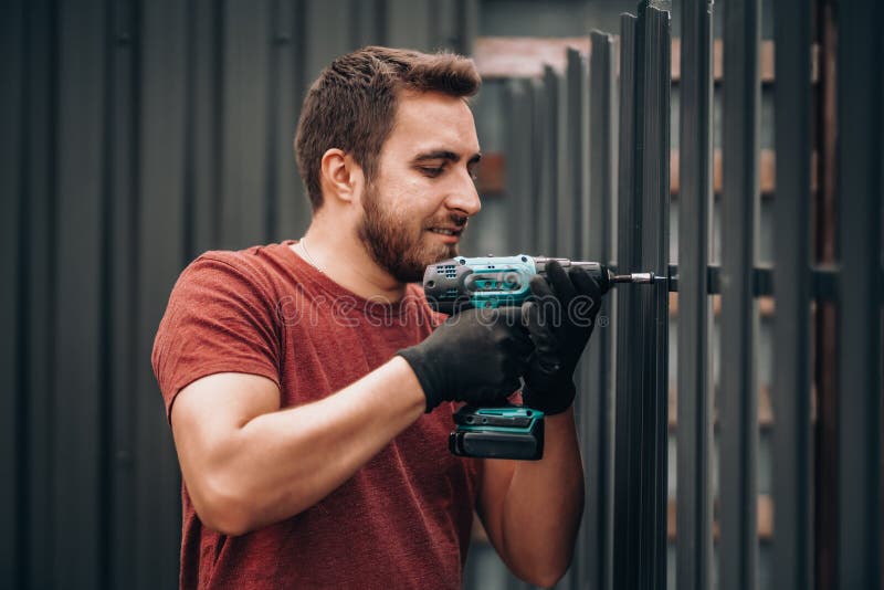 Construction Man Working with Cordless Screwdriver Stock Photo - Image ...