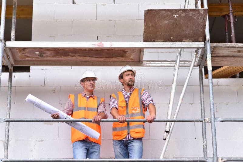 Construction Manager and Architect on Site during the Construction of a ...