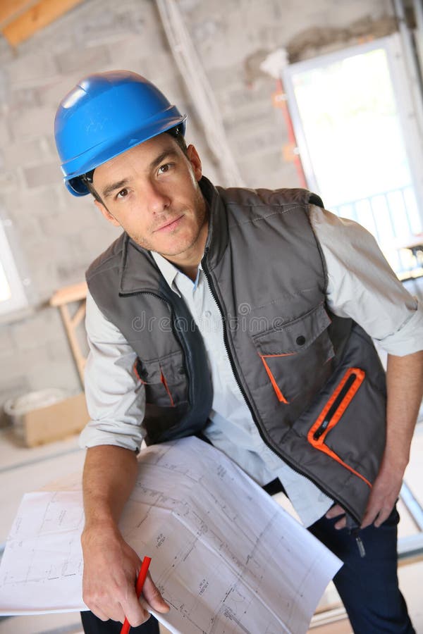Construction Manager with Blueprint Stock Photo - Image of holding ...