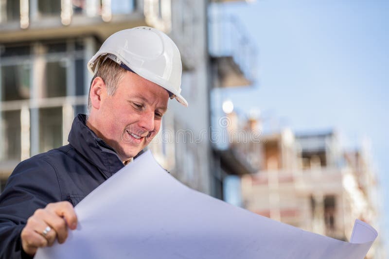 Construction Manager with Blueprints Stock Image - Image of plans ...