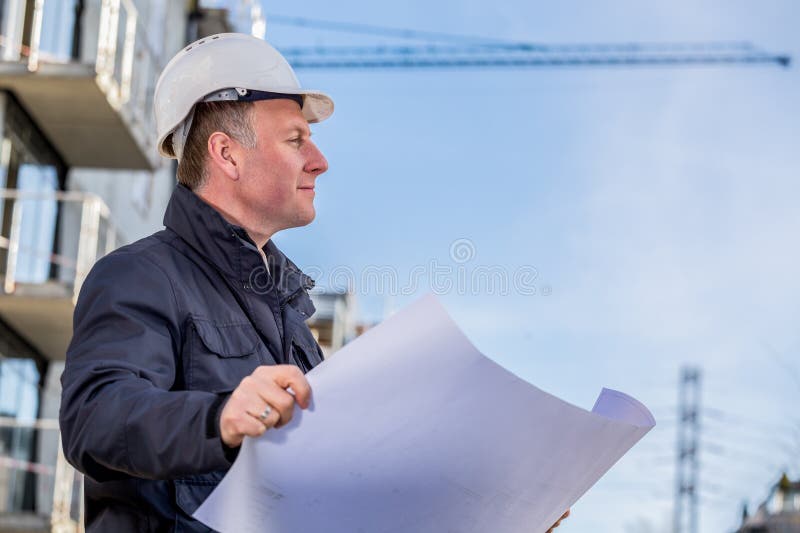 Construction Manager with Blueprints Stock Photo - Image of ...
