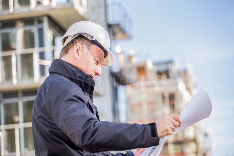 Construction Manager with Blueprints Stock Image - Image of apartment ...