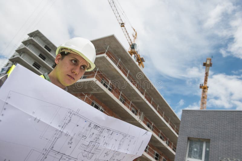 Construction Manager Checking Building Project on Site Stock Photo ...