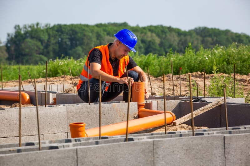 Construction or Site Manager Overseeing the Construction New Building ...