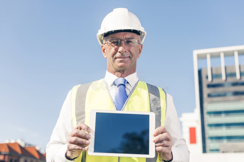 Construction Manager Controlling Building Site and Tablet Device Stock ...