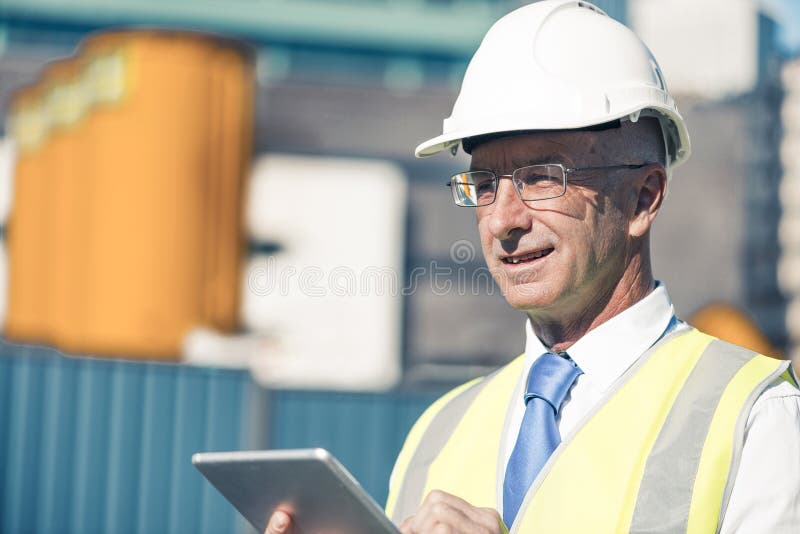 Construction Manager Controlling Building Site and Tablet Device Stock ...