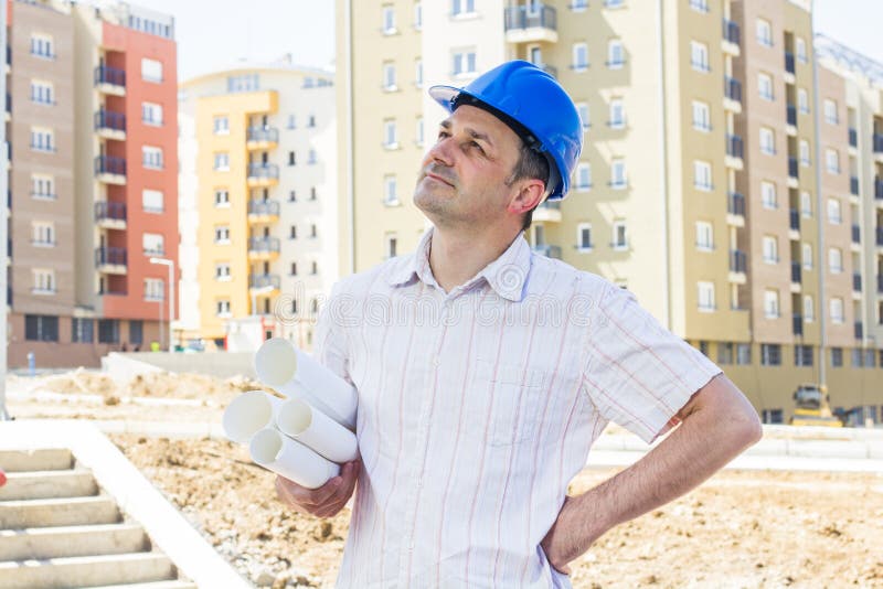 Construction Manager Holding Project Stock Photo - Image of hardhat ...