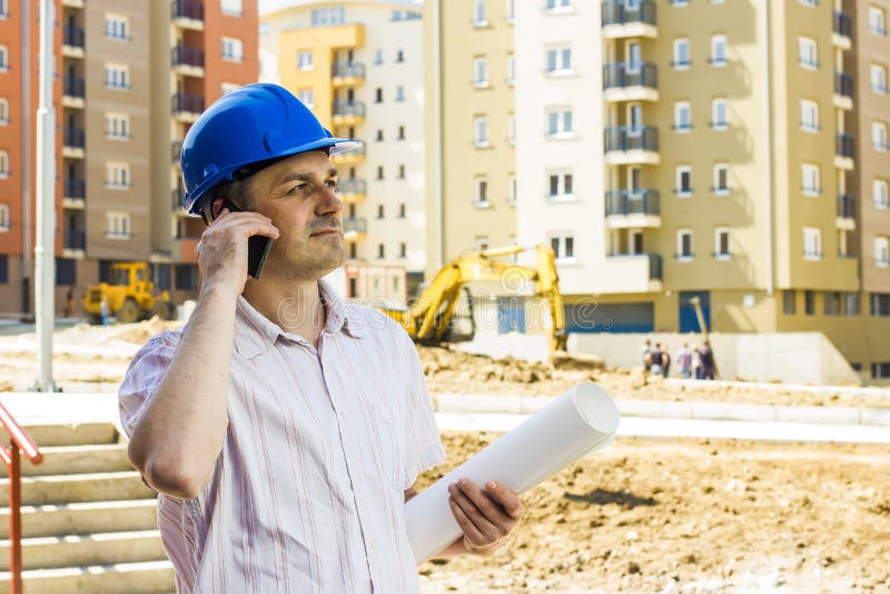 Construction Manager Holding Project Stock Photo - Image of hardhat ...