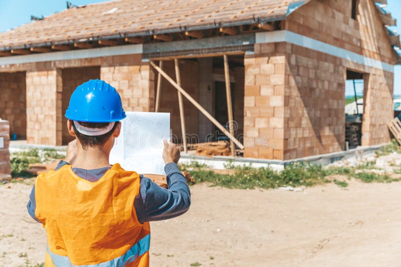 The Construction Manager Inspects the Project on the Construction of a ...