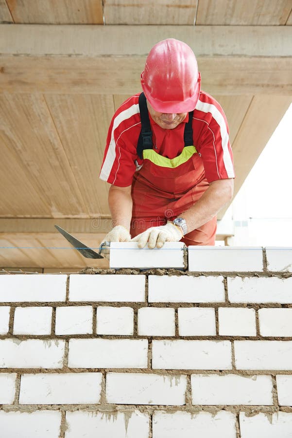 Bricklayer or Builders on Construction Site Working Stock Photo - Image ...