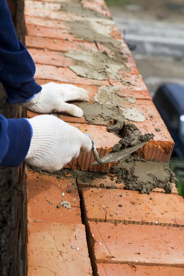 Construction Mason Worker Bricklayer Installing Brick Stock Photo ...
