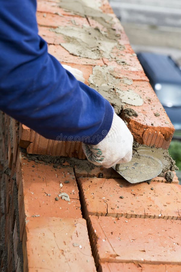 Construction Mason Worker Bricklayer Installing Brick Stock Photo ...
