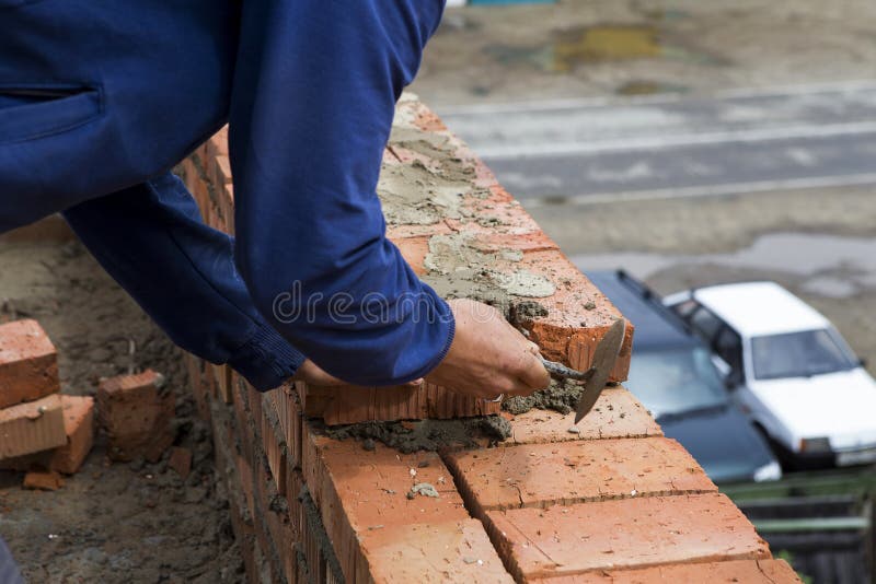 Construction Mason Worker Bricklayer Installing Brick Stock Photo ...
