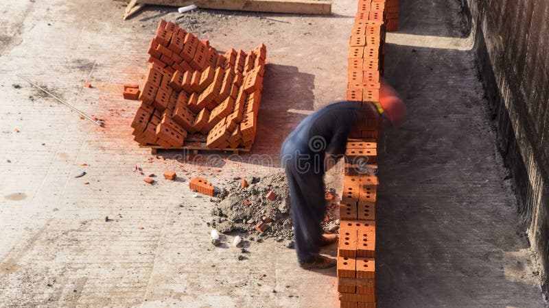 A Mason Worker Building Up a Concrete Slab Stock Footage - Video of ...