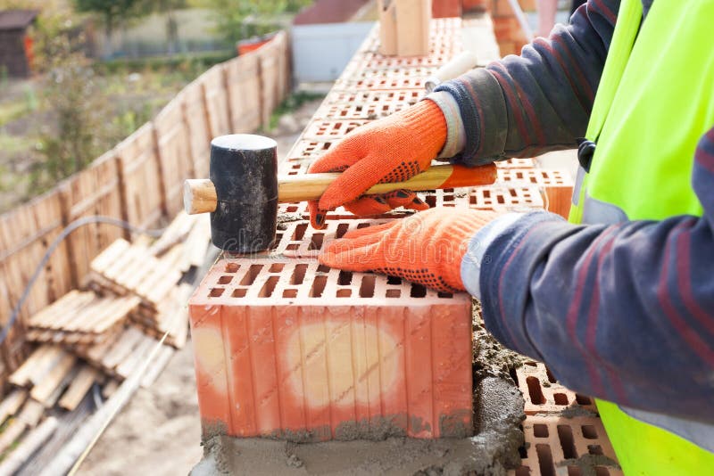 Construction Mason Worker Bricklayer Laying Concrete Block Foundation ...