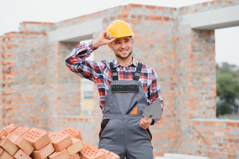 Construction Mason Worker Bricklayer Installing Red Brick with Trowel ...
