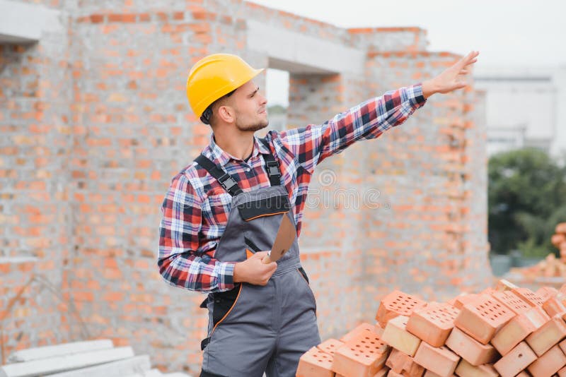 Construction Mason Worker Bricklayer Installing Red Brick with Trowel ...