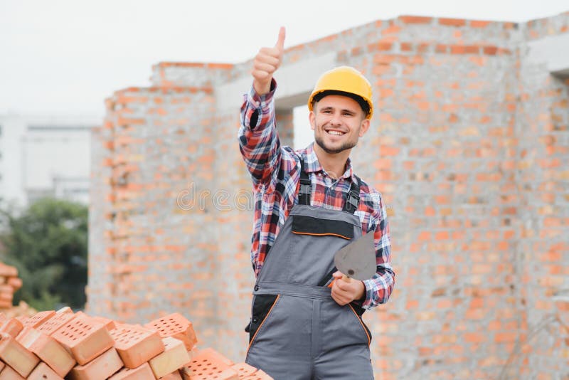 Construction Mason Worker Bricklayer Installing Red Brick with Trowel ...